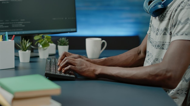 Premium Photo | Close up of black hands coding server interface with ...