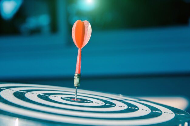 Premium Photo | Close-up the bullseye has dart arrow hitting the center. Premium Photo | Close-up the bullseye has dart arrow hitting the center.