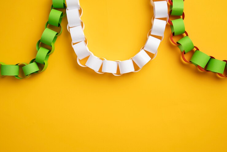 Free Photo | Colorful paper chains still life Free Photo | Colorful paper chains still life