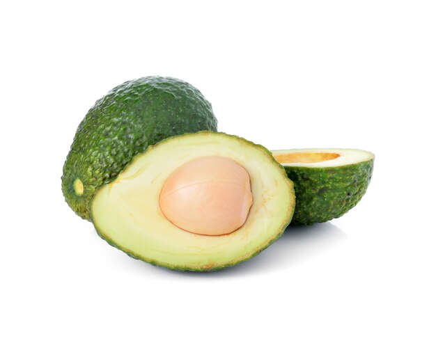 Premium Photo | Fresh avocados isolated on white Premium Photo | Fresh avocados isolated on white