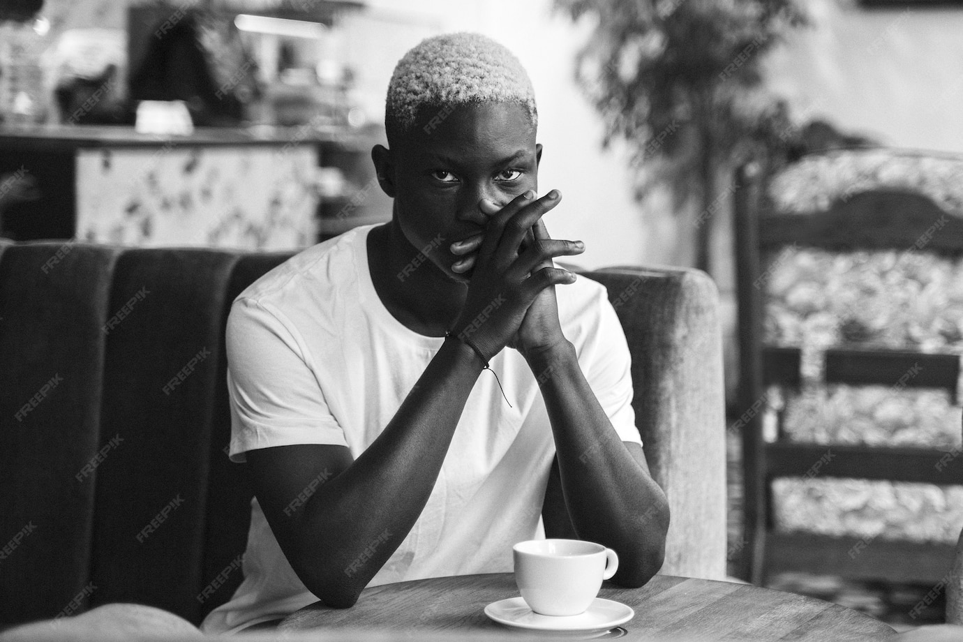 Free Photo | Front view man sitting at table Free Photo | Front view man sitting at table