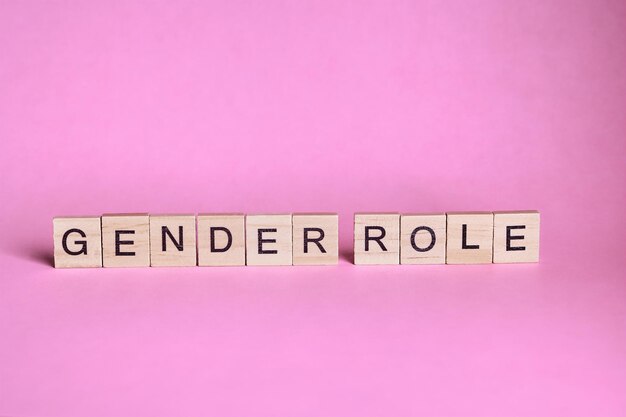 Premium Photo Queer Words Represented By Wooden Letter Tiles Isolated
