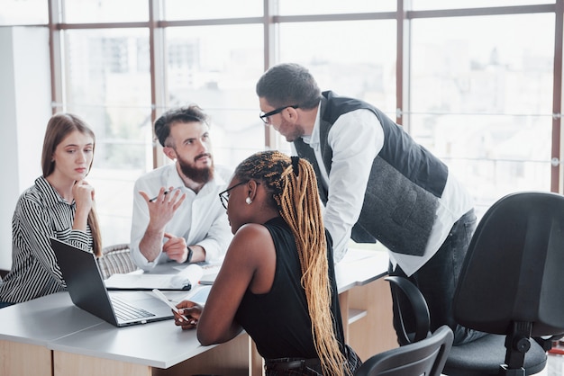 Free Photo | A group of multinational busy people working in the office Free Photo | A group of multinational busy people working in the office