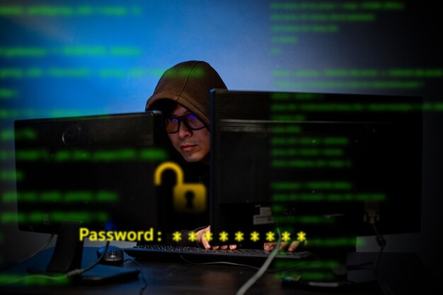 Premium Photo Hackers Programmer Using Computer Laptop For Hack