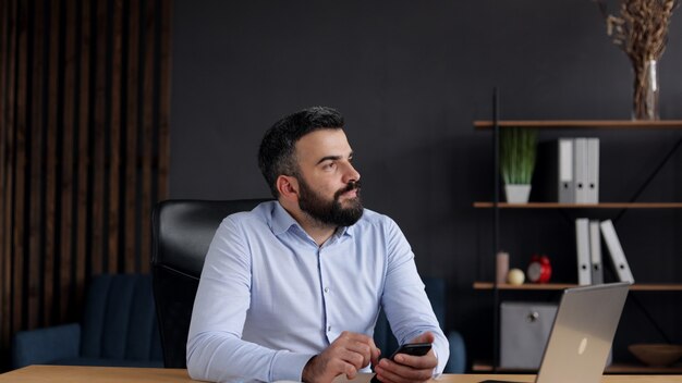 Premium Photo Happy Handsome Man Using Mobile Phone Apps Texting