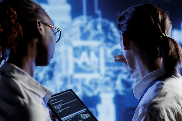 Free Photo It Consultants Brainstorm Ways To Use Ai Cognitive Computing To Extract Usable