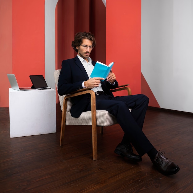 Free Photo | Side view man reading book Free Photo | Side view man reading book