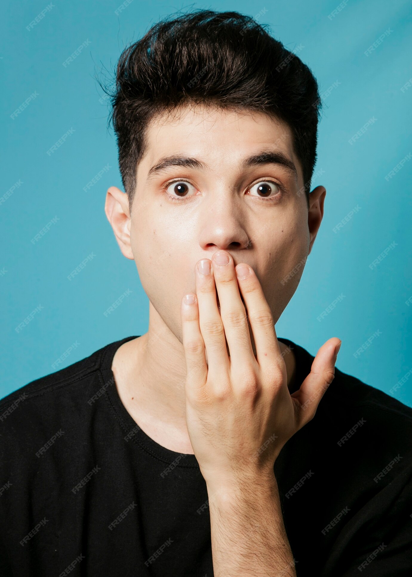 Free Photo Man Covering His Mouth With Hand