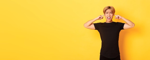 Free Photo | Portrait of annoyed and bothered asian guy grimacing shut ... Free Photo | Portrait of annoyed and bothered asian guy grimacing shut ...