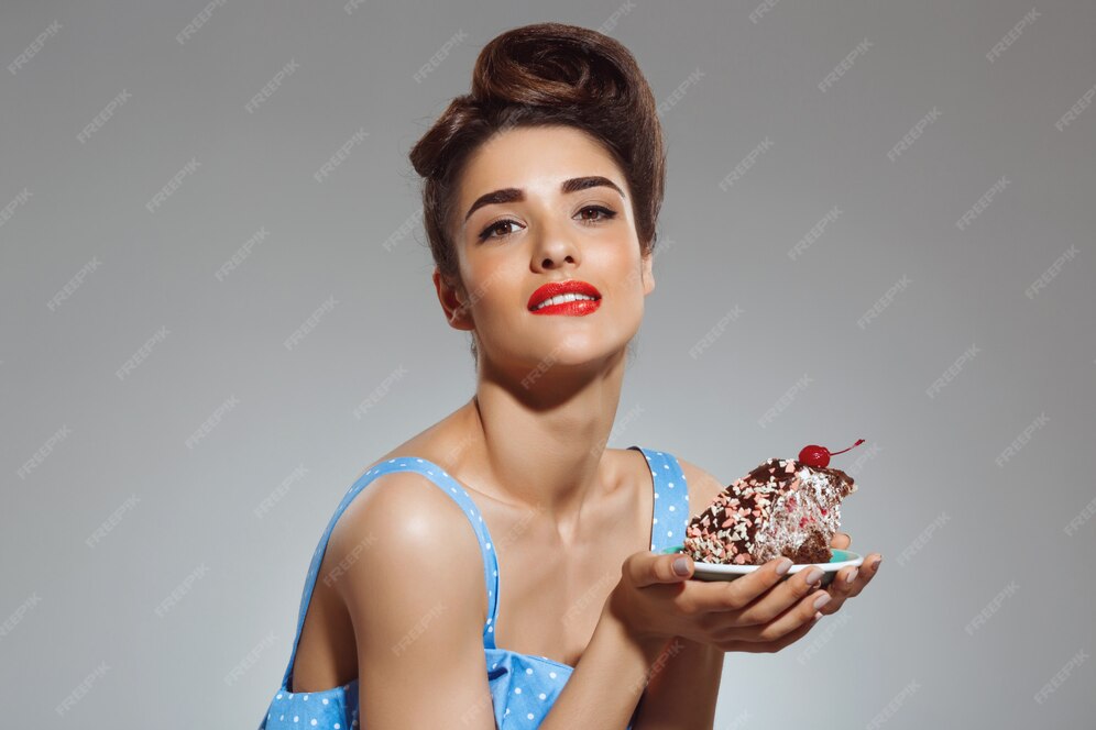 Free Photo Portrait Of Beautiful Pin Up Woman Holding Cake In Hands