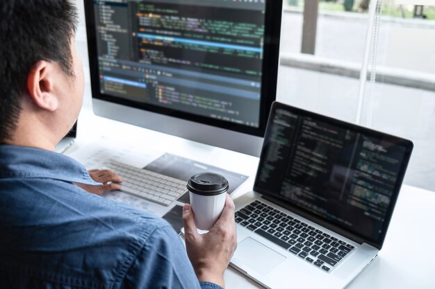 Premium Photo | Professional team of programmer working on project in software development ...