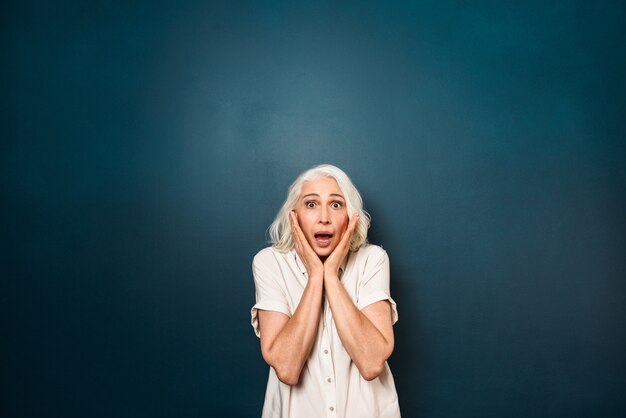 Premium Photo | Cheerful mature old woman standing isolated Premium Photo | Cheerful mature old woman standing isolated
