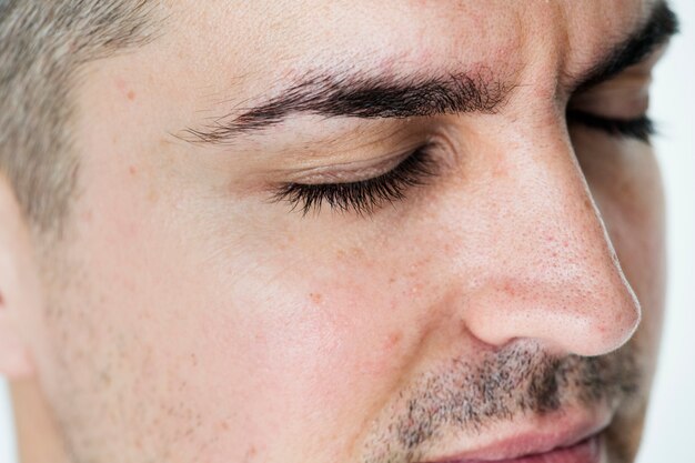 Free Photo Side Portrait Of White Man Closeup On Closed Eyes