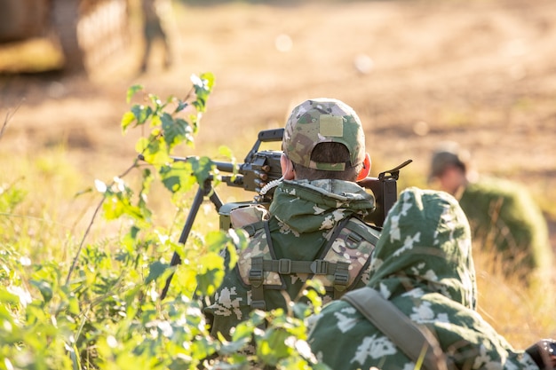Premium Photo | Sniper armed with large caliber, sniper rifle, shooting ... Premium Photo | Sniper armed with large caliber, sniper rifle, shooting ...
