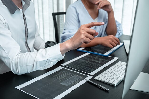 Premium Photo | Programmers working on a project in software development