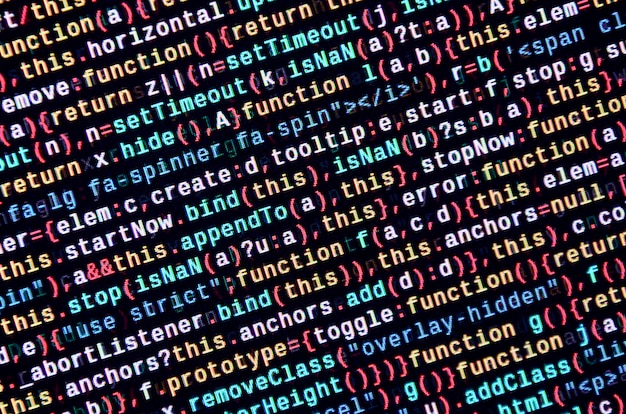 Premium Photo | Writing programming code on laptop. digital binary data ...