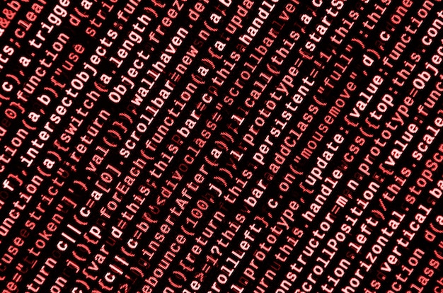 Premium Photo | Writing programming code on laptop. digital binary data on computer screen