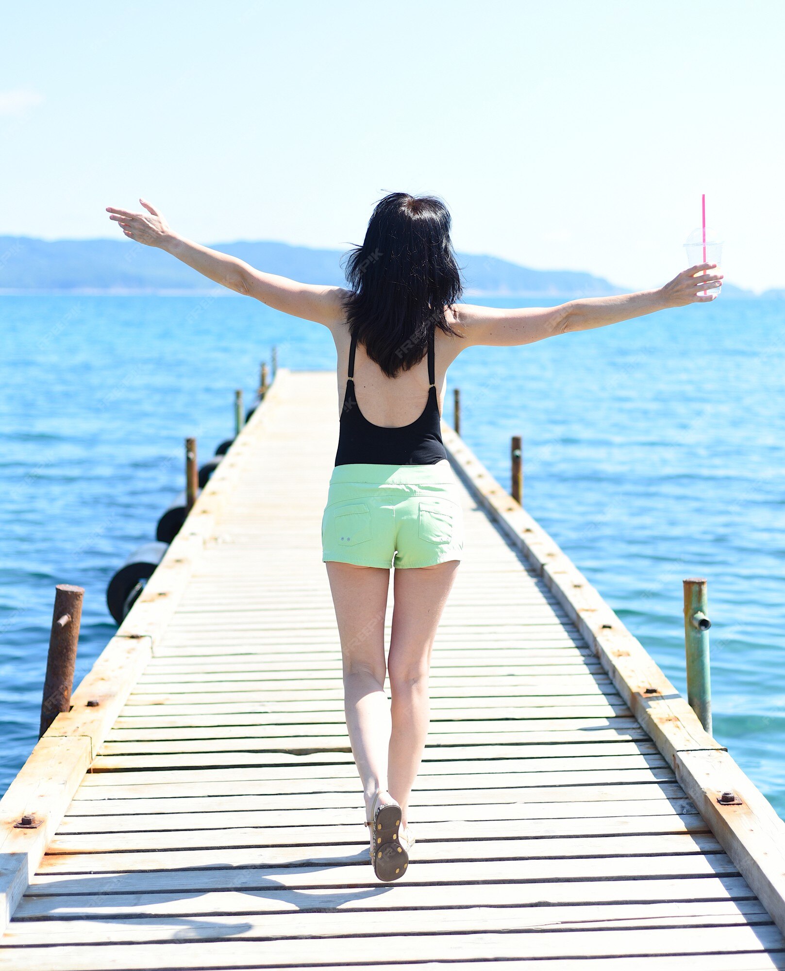 Premium Photo 45 Years Old Russian Woman With Lemonad Running On Pier