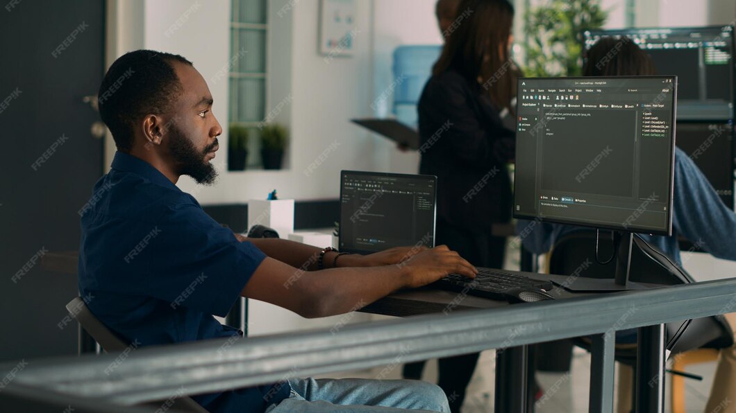 Premium Photo African American Coder Developing App Interface With 0755