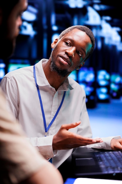 Premium Photo | African american expert and colleague dealing with ... Premium Photo | African american expert and colleague dealing with ...