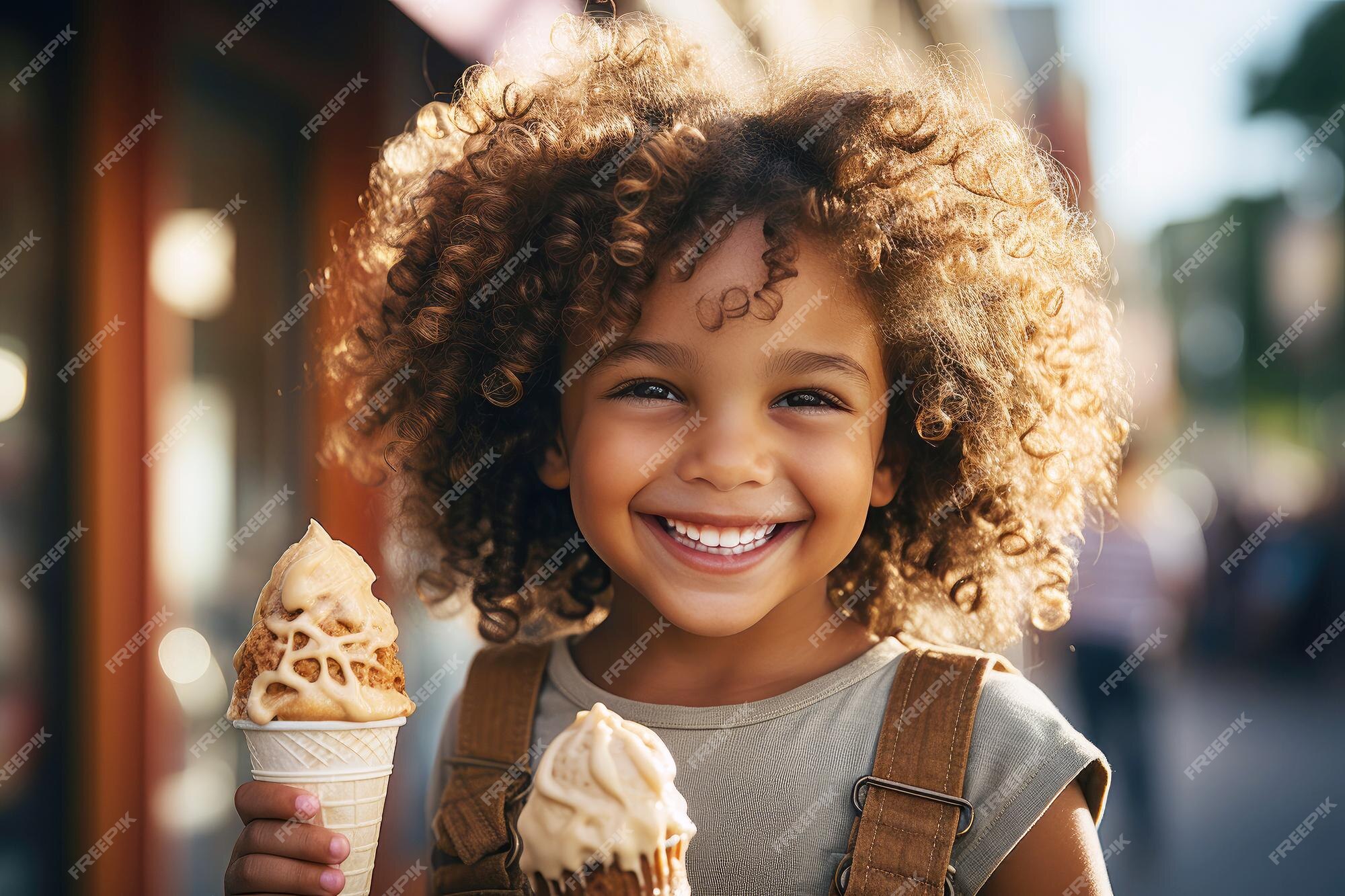 Premium Photo An African American Girl Relishing Ice Cream In A