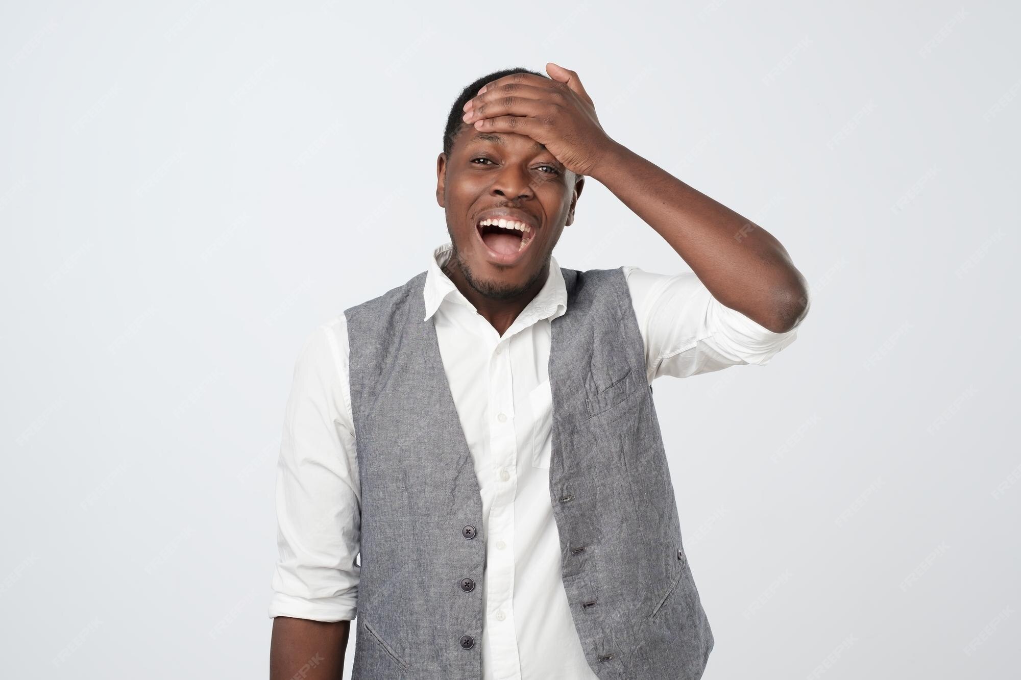 Premium Photo African Man Remembering Funny Momen Laughing Out Loud