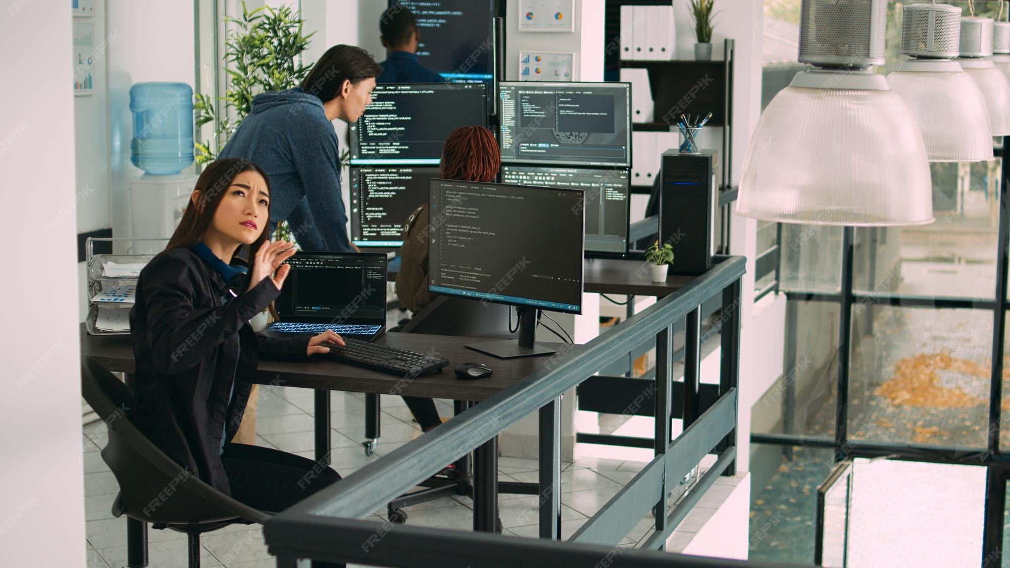 Premium Photo | Asian data admin working with hologram and coding language in programming agency ...