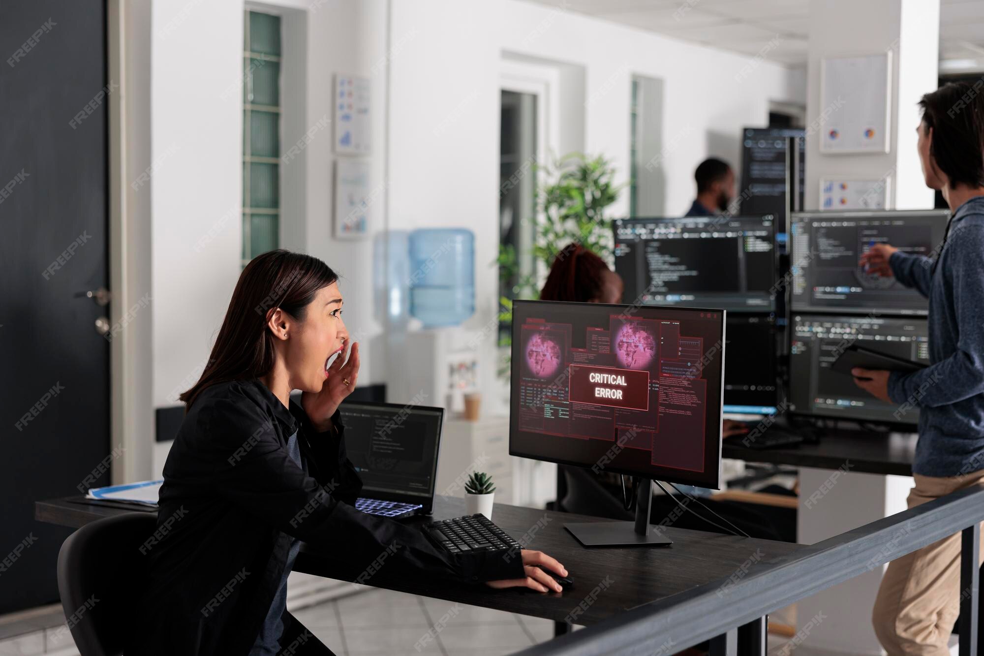 Premium Photo | Asian it programmer reading critical errors on computer display in it big data ...