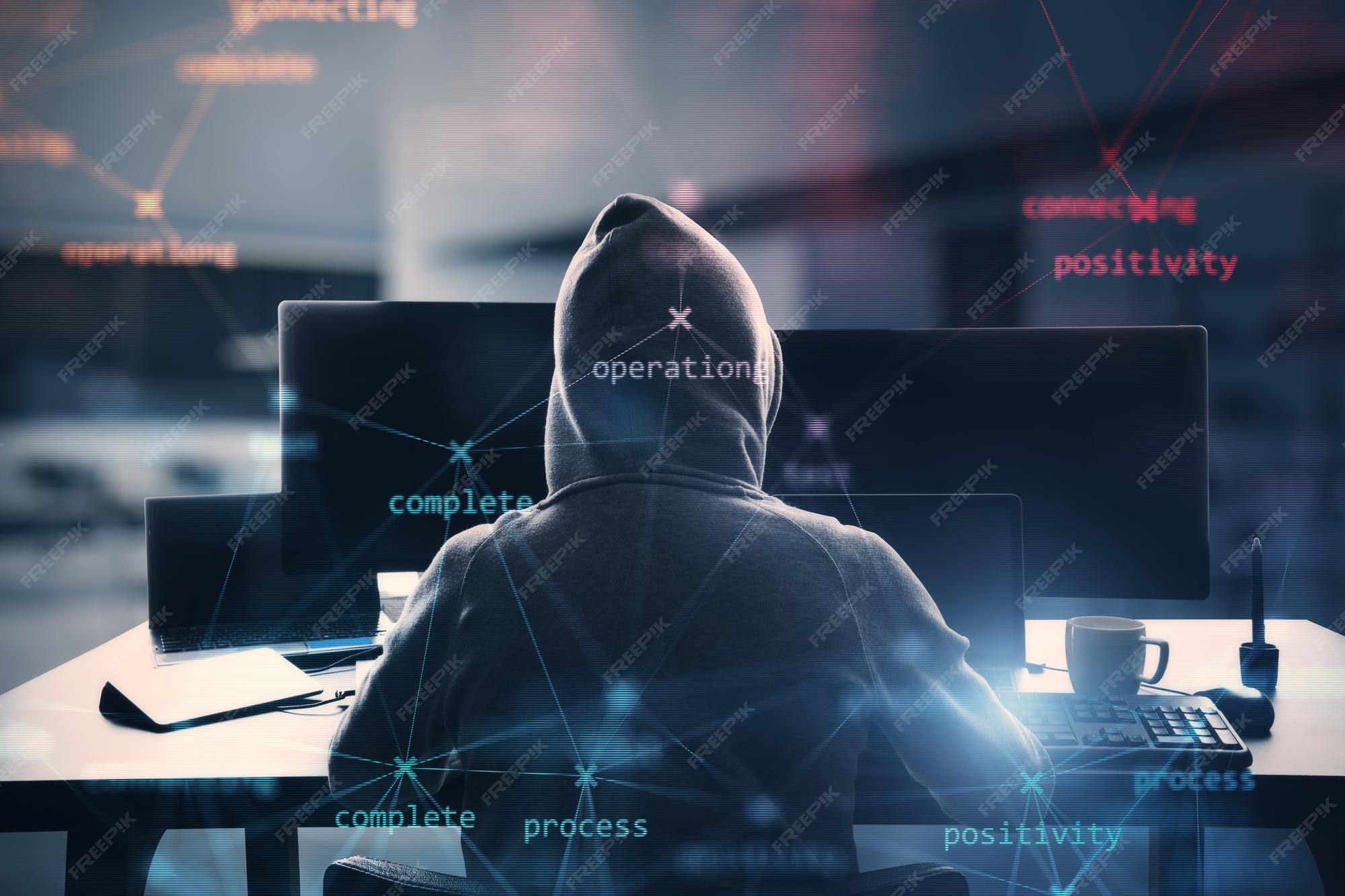 Premium Photo | Back view of hacker at desktop using computers with ...