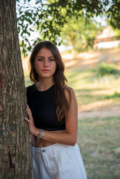 Premium Photo Beautiful Italian Girl At The Park Wearing A Dress 