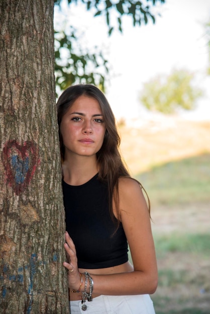 Premium Photo Beautiful Italian Girl At The Park Wearing A Dress