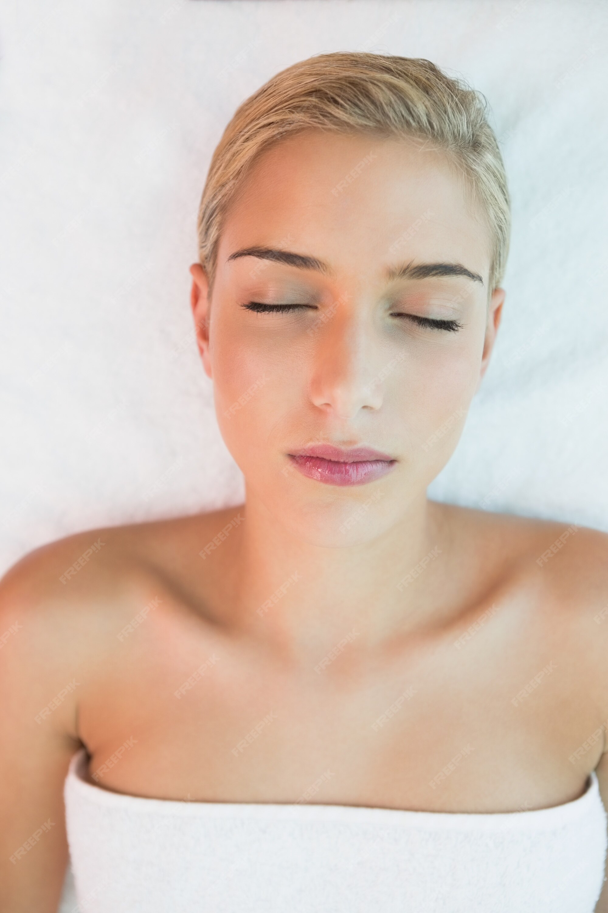 Premium Photo Beautiful Woman Lying On Massage Table At Spa Center