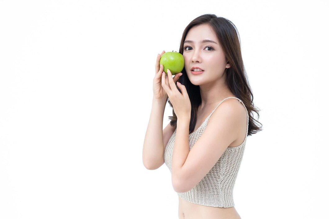 Premium Photo Beautiful Young Sexy Asian Woman Holding Green Apple