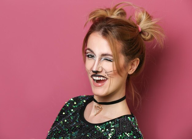 Premium Photo Beautiful Young Woman With Cat Makeup On Color Background