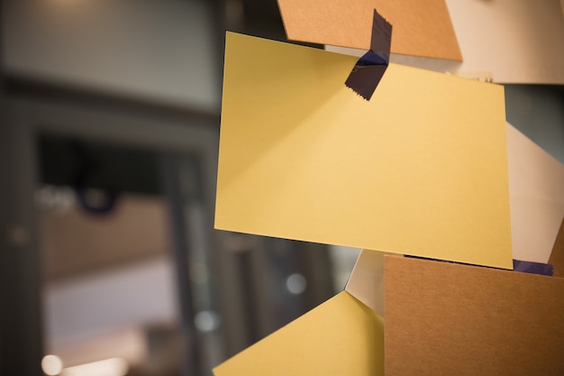 Premium Photo | Blank sticky notes hanging Premium Photo | Blank sticky notes hanging