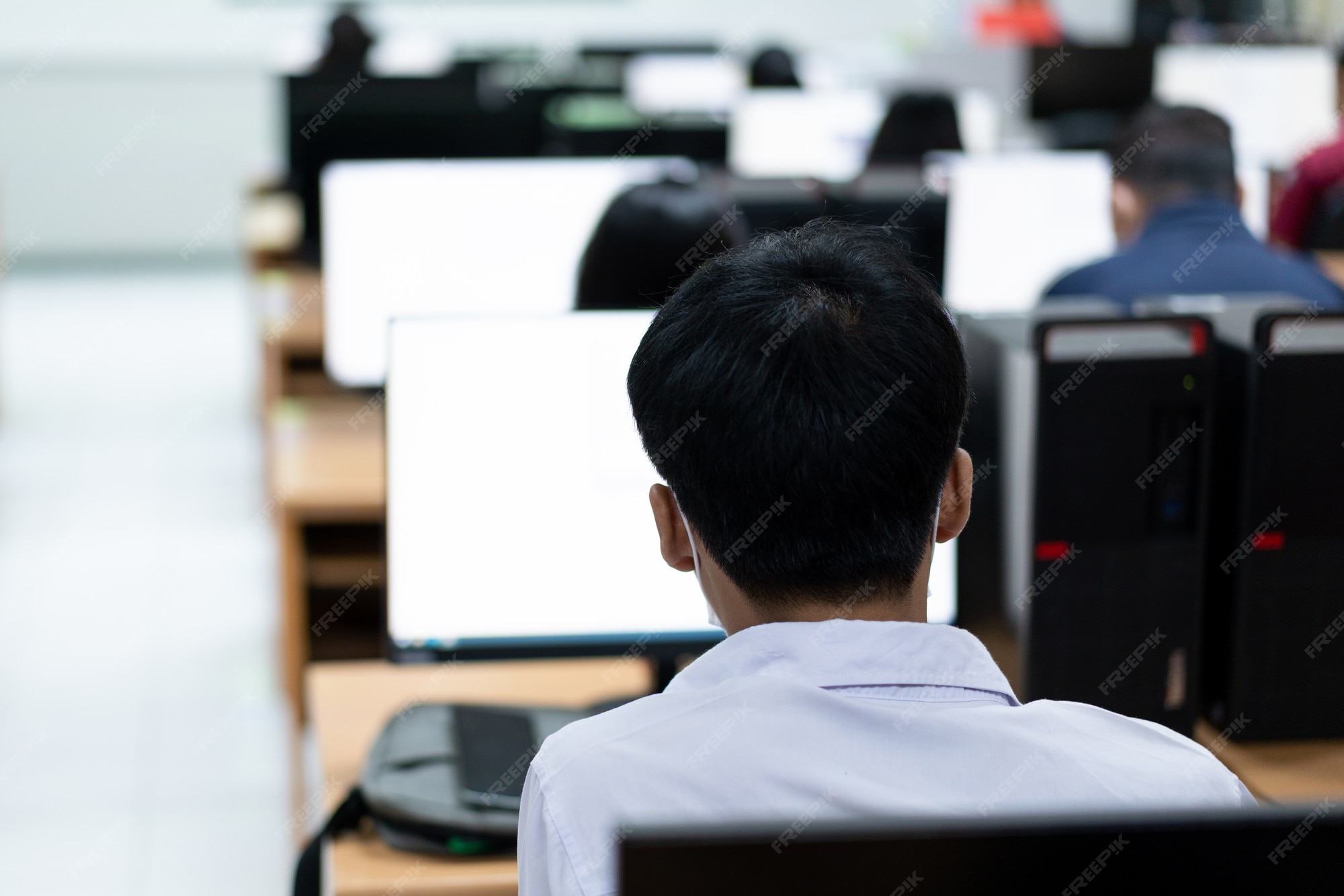 Premium Photo | Blur and selective focus of the university student using computer studying in ...
