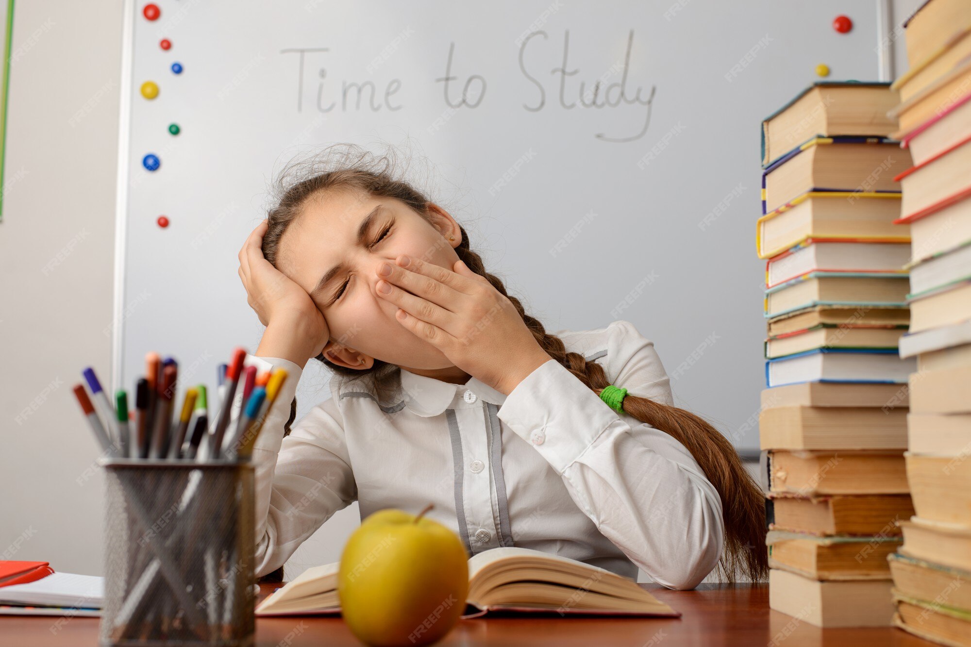 Premium Photo | Bored and tired elementary school learner yawning ... Premium Photo | Bored and tired elementary school learner yawning ...