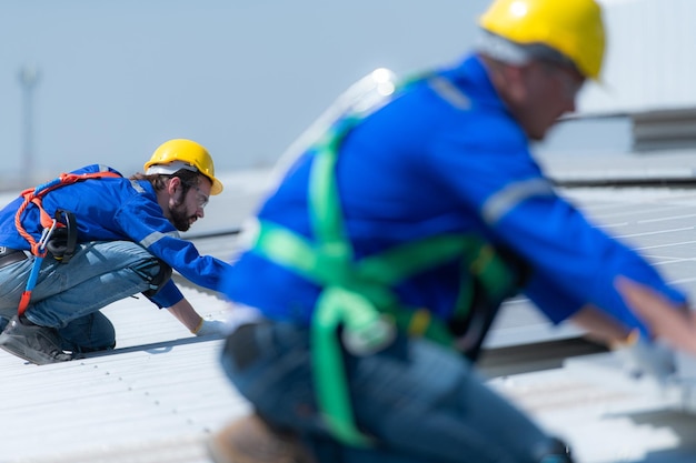 Premium Photo Both Of Technicians Is Installing Solar Panels On The Roof Of The Warehouse To