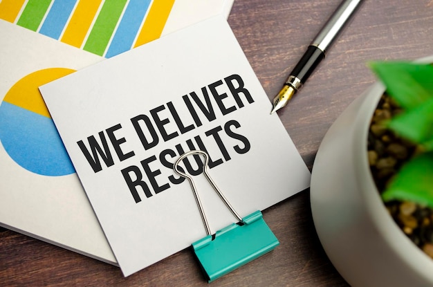 Premium Photo | Business concept notebook with text we deliver results ... Premium Photo | Business concept notebook with text we deliver results ...