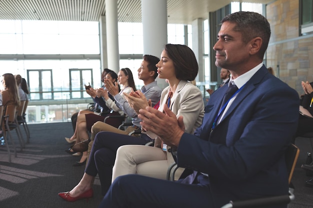 Premium Photo | Business people applauding in a business seminar Premium Photo | Business people applauding in a business seminar