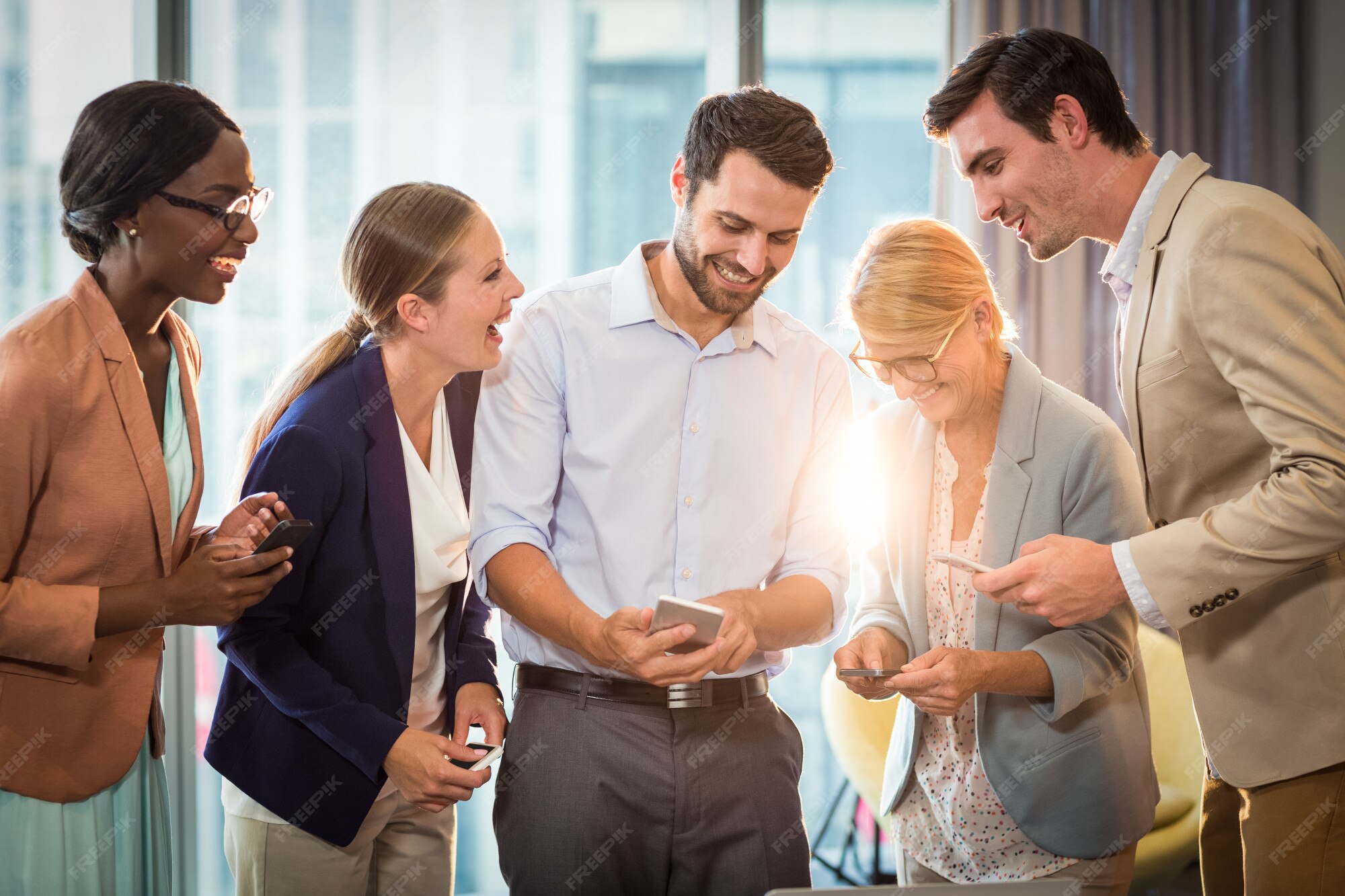 Premium Photo | Business people interacting using mobile phone Premium Photo | Business people interacting using mobile phone