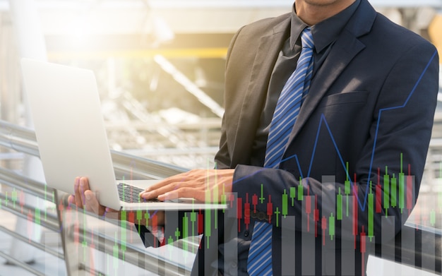 Premium Photo | Businessman check graph on notebook, finance concept Premium Photo | Businessman check graph on notebook, finance concept