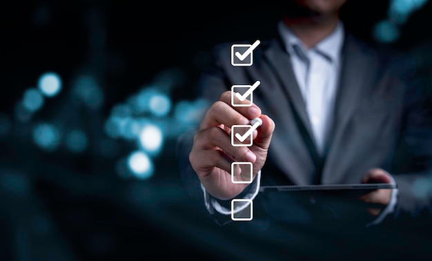 Premium Photo | Businessman use pen to tick correct sign mark in ... Premium Photo | Businessman use pen to tick correct sign mark in ...