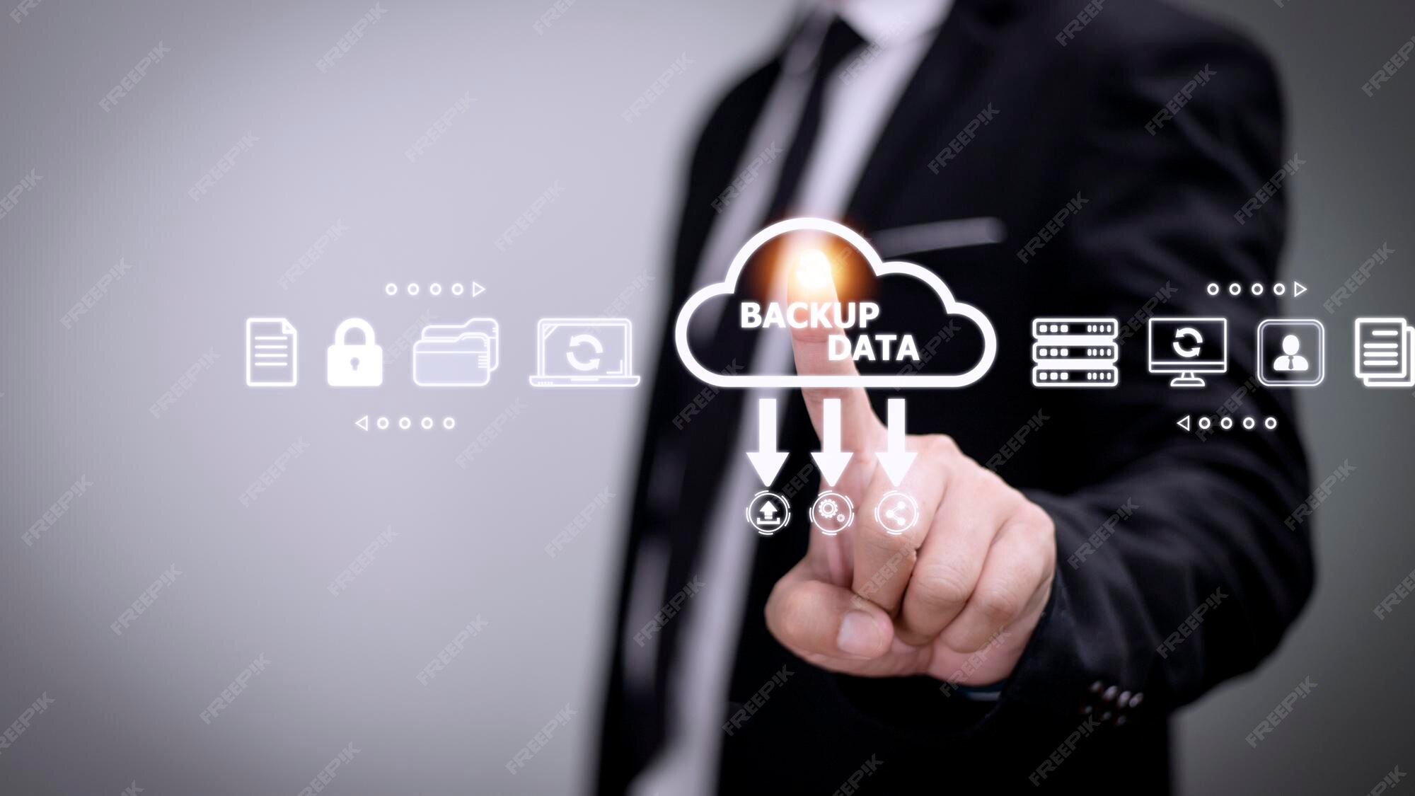 Premium Photo | Businessman using a computer to backup storage data Internet technology concept ...