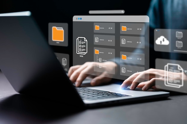 Premium Photo | Businessman using a computer to document management ...