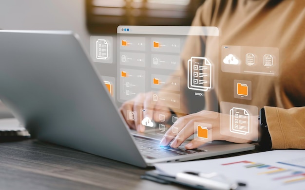 Premium Photo | Businessman using a computer to document management concept online documentation ...