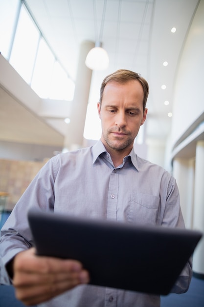 Premium Photo | Businessman using digital tablet Premium Photo | Businessman using digital tablet