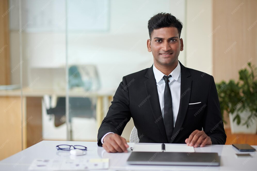 Premium Photo | Cheerful young entrepreneur Premium Photo | Cheerful young entrepreneur
