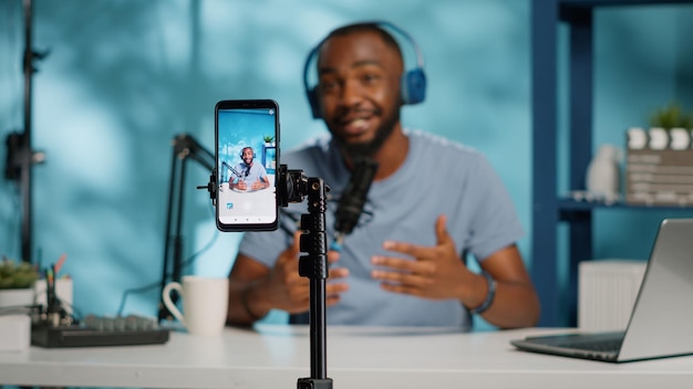 Premium Photo | Close up of blogger filming video with smartphone on ... Premium Photo | Close up of blogger filming video with smartphone on ...