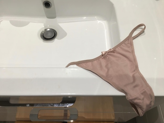 Premium Photo Close Up Of Panties On Sink In Bathroom